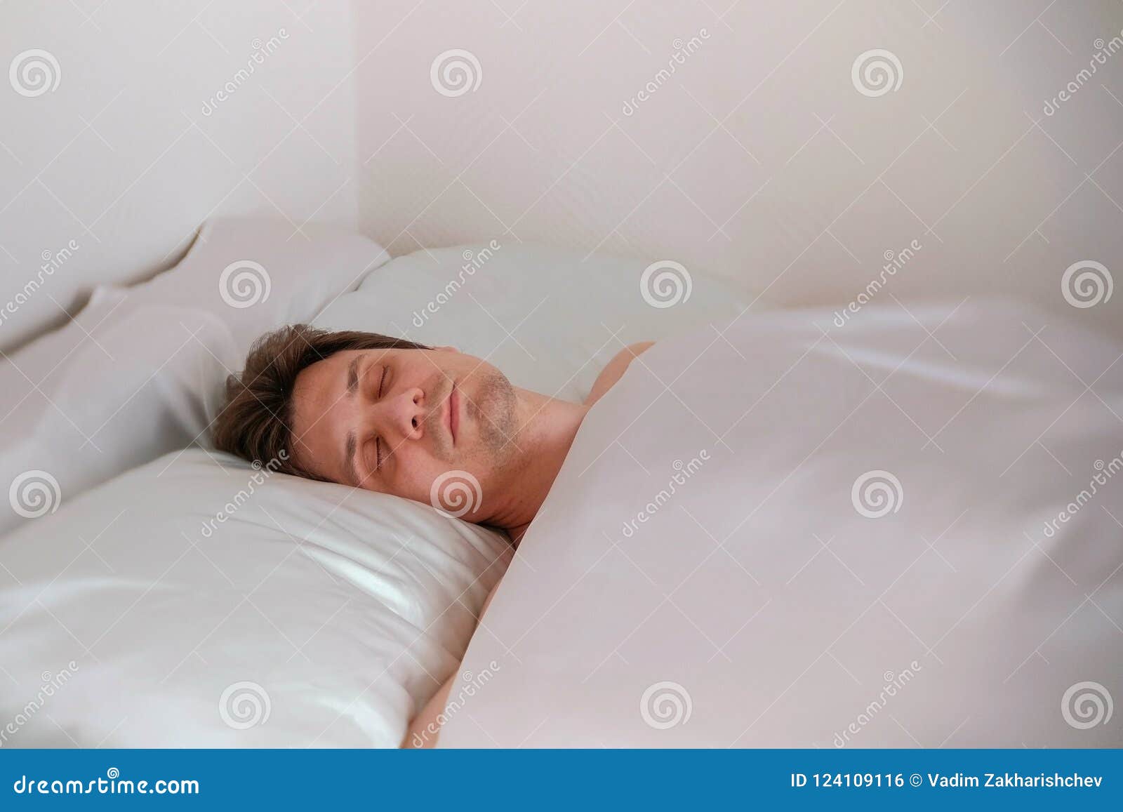 Man is Sleeping in the Bed Alone. Stock Photo - Image of bedroom, calm ...