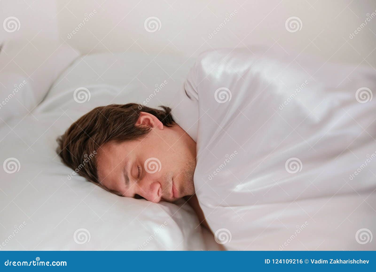 Man is Sleeping in Bed Alone Under the Blanket. Side View. Stock Photo ...