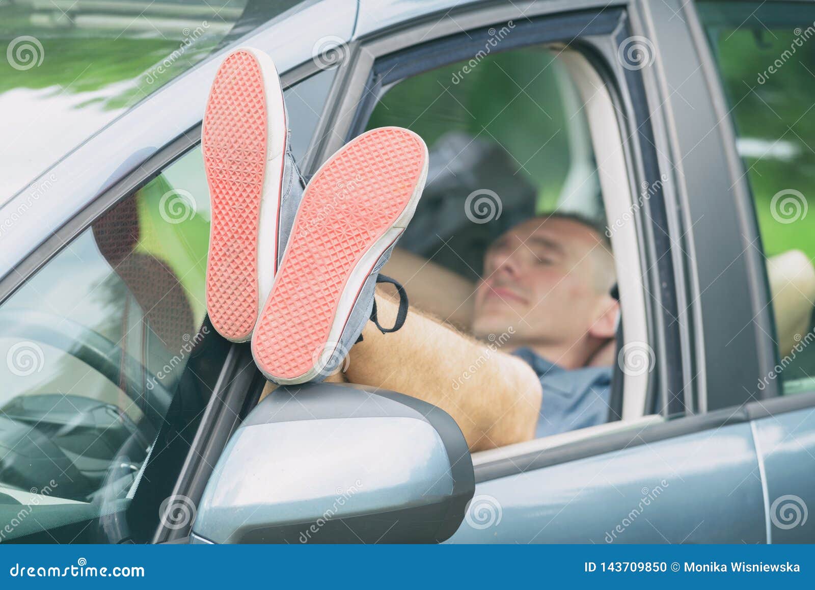 Man sleeping in the car stock photo. Image of sleeping - 143709850