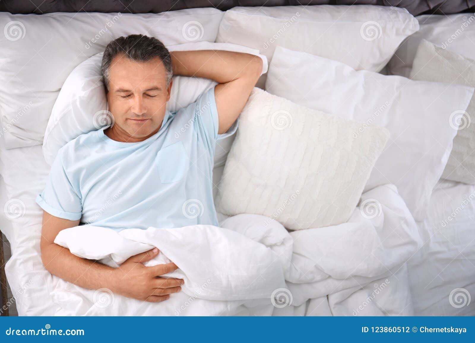 Man Sleeping on Comfortable Pillow in Bed Stock Photo - Image of male ...