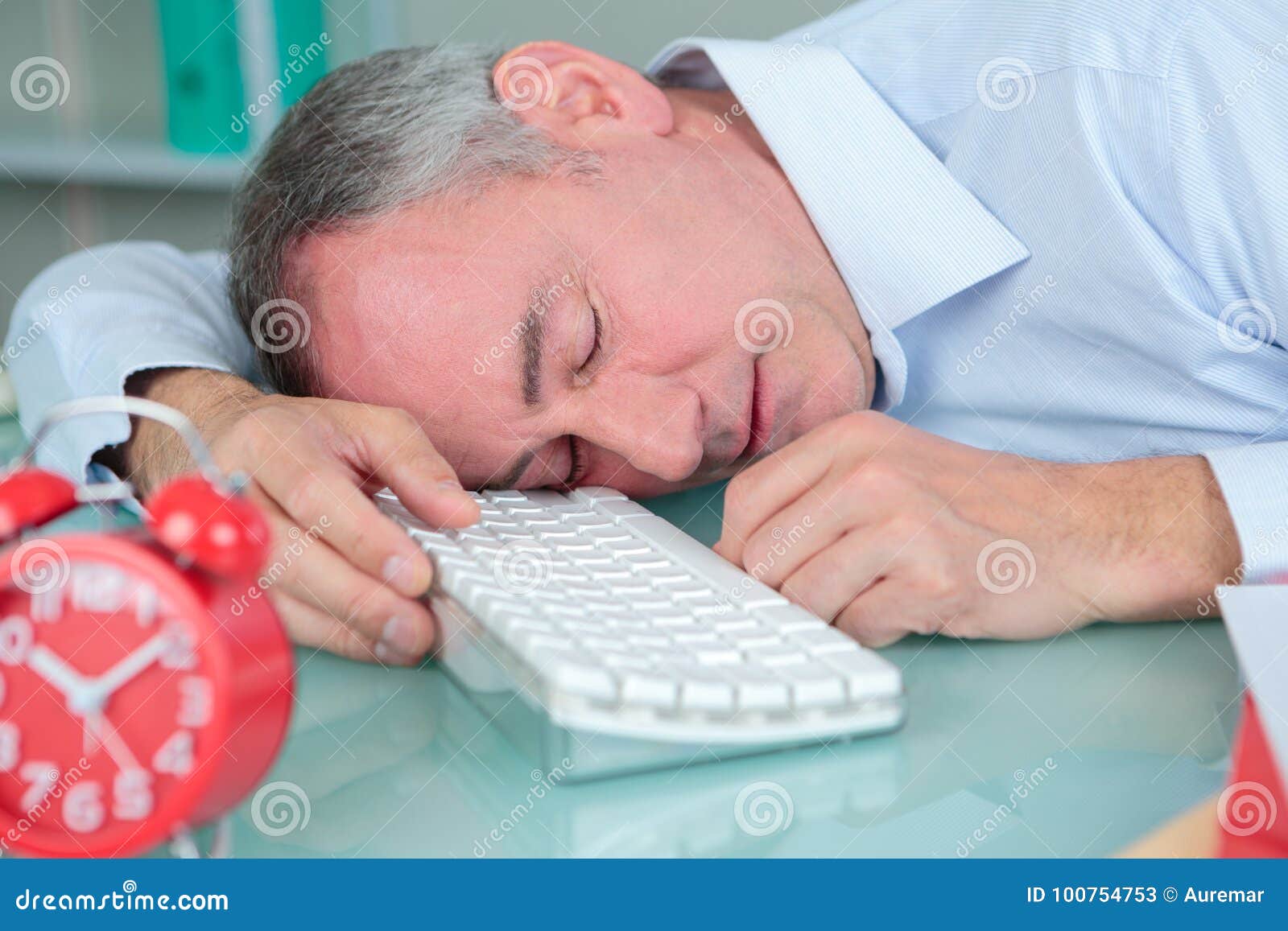 Man Sleeping on Desk in Bright Modern Office Stock Image - Image of ...