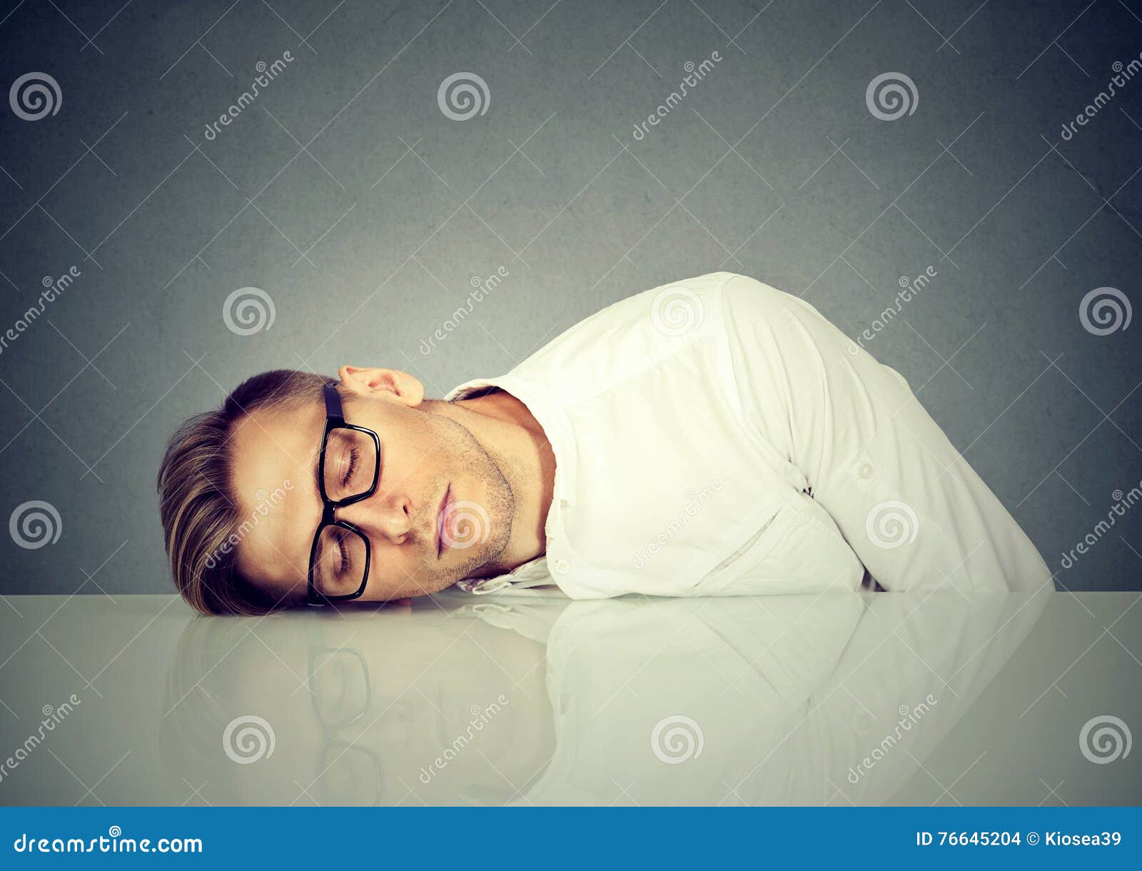 Man sleeping on a desk stock photo. Image of rest, concept - 76645204