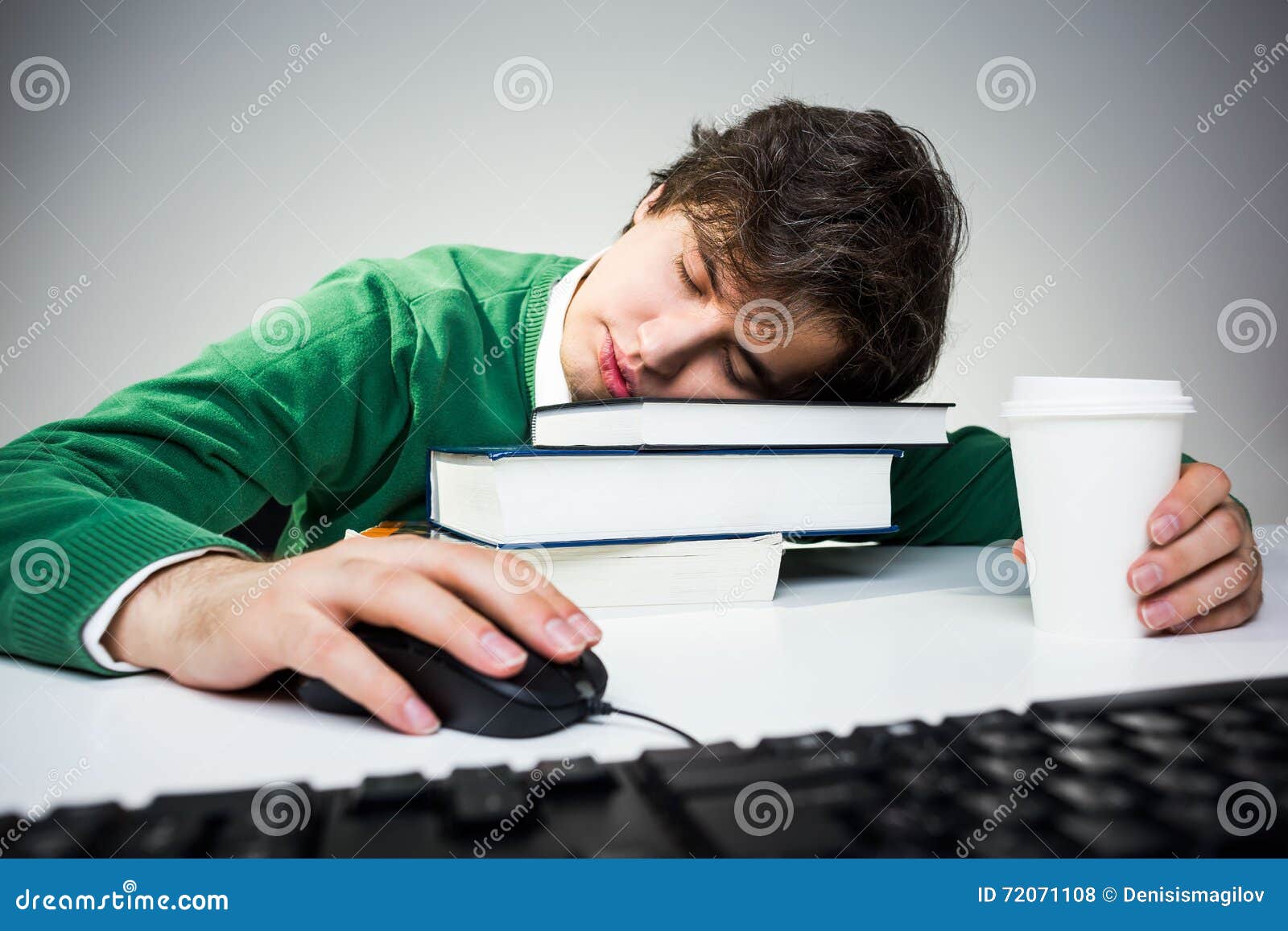 Man sleeping on desk stock photo. Image of books, exhausted - 72071108