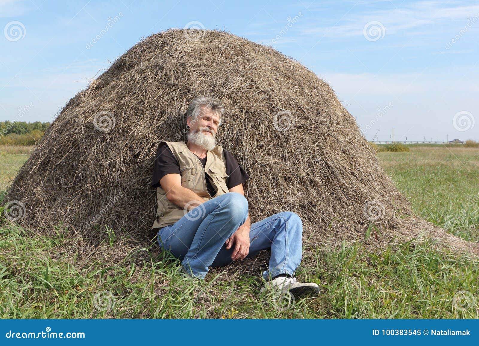 Man Sleeping in a Field Near a Haystack in the Fall Stock Image - Image ...