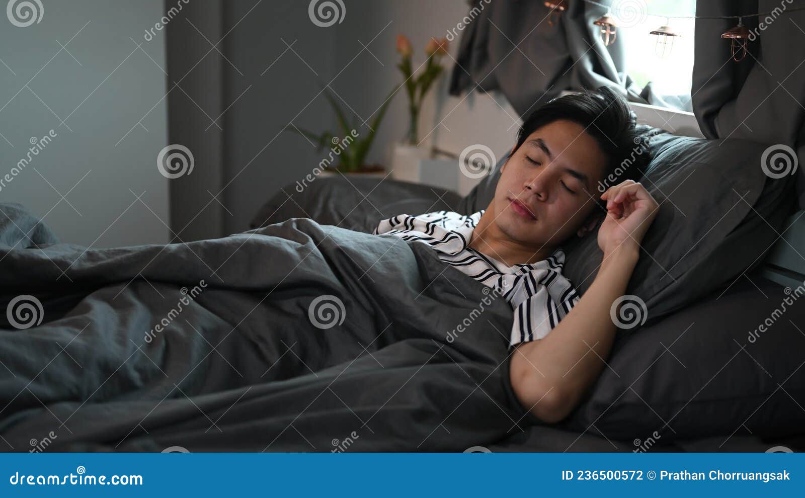 Man Sleeping in His Comfortable Bed after Tiring Day. Stock Photo ...