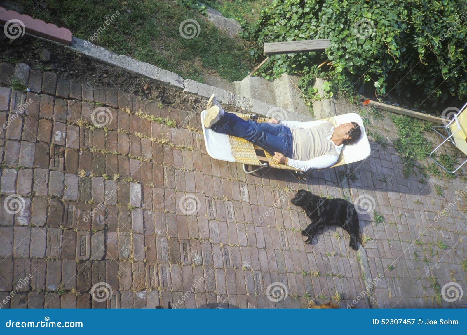 Man Sleeping on Lounge in Patio, Santa Monica, CA Editorial Photography ...