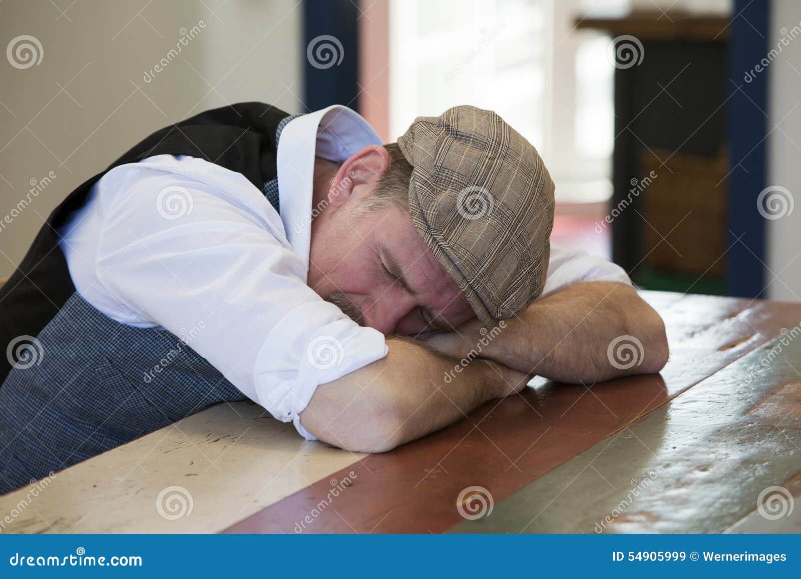 Man sleeping at table stock image. Image of asleep, male - 54905999