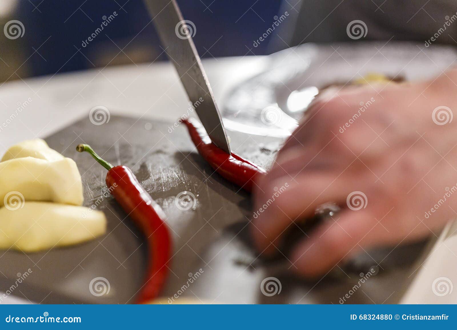 Man Slicing Chilli Pepper with Knife Stock Photo - Image of hand ...
