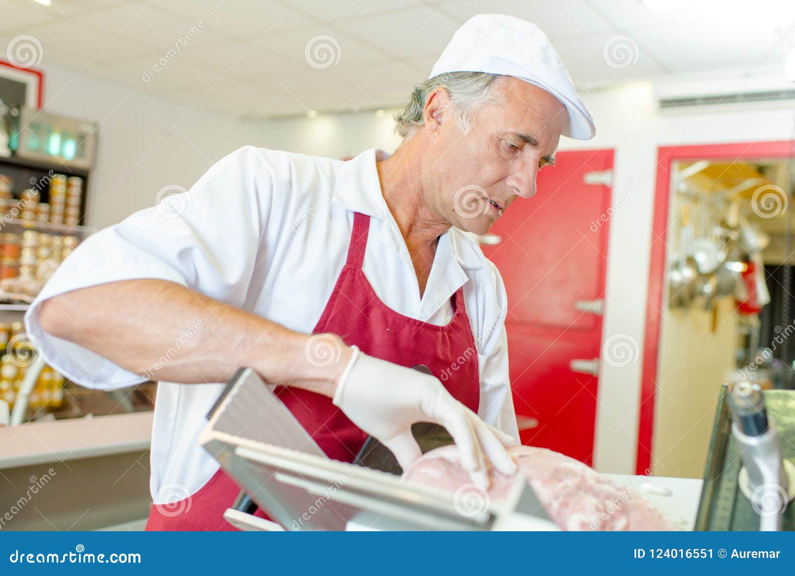 Man Slicing Meat with Machine Stock Image - Image of standing, person ...
