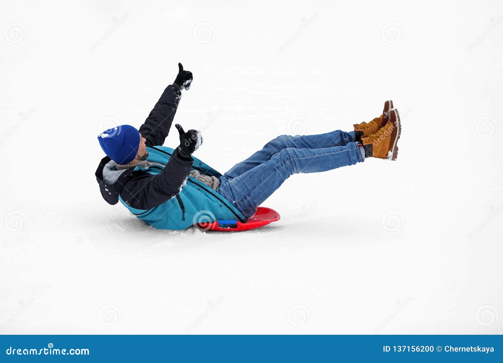 Man Sliding on Sled Outdoors. Winter Stock Photo - Image of leisure ...