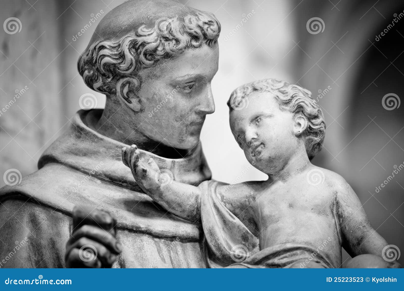 Man with small boy statue. stock image. Image of head - 25223523