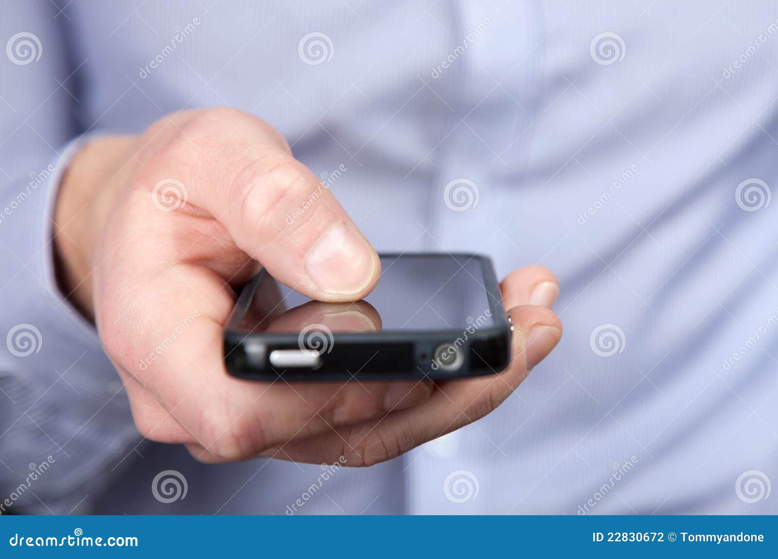 Man with a smartphone stock photo. Image of iphone, smartphone - 22830672