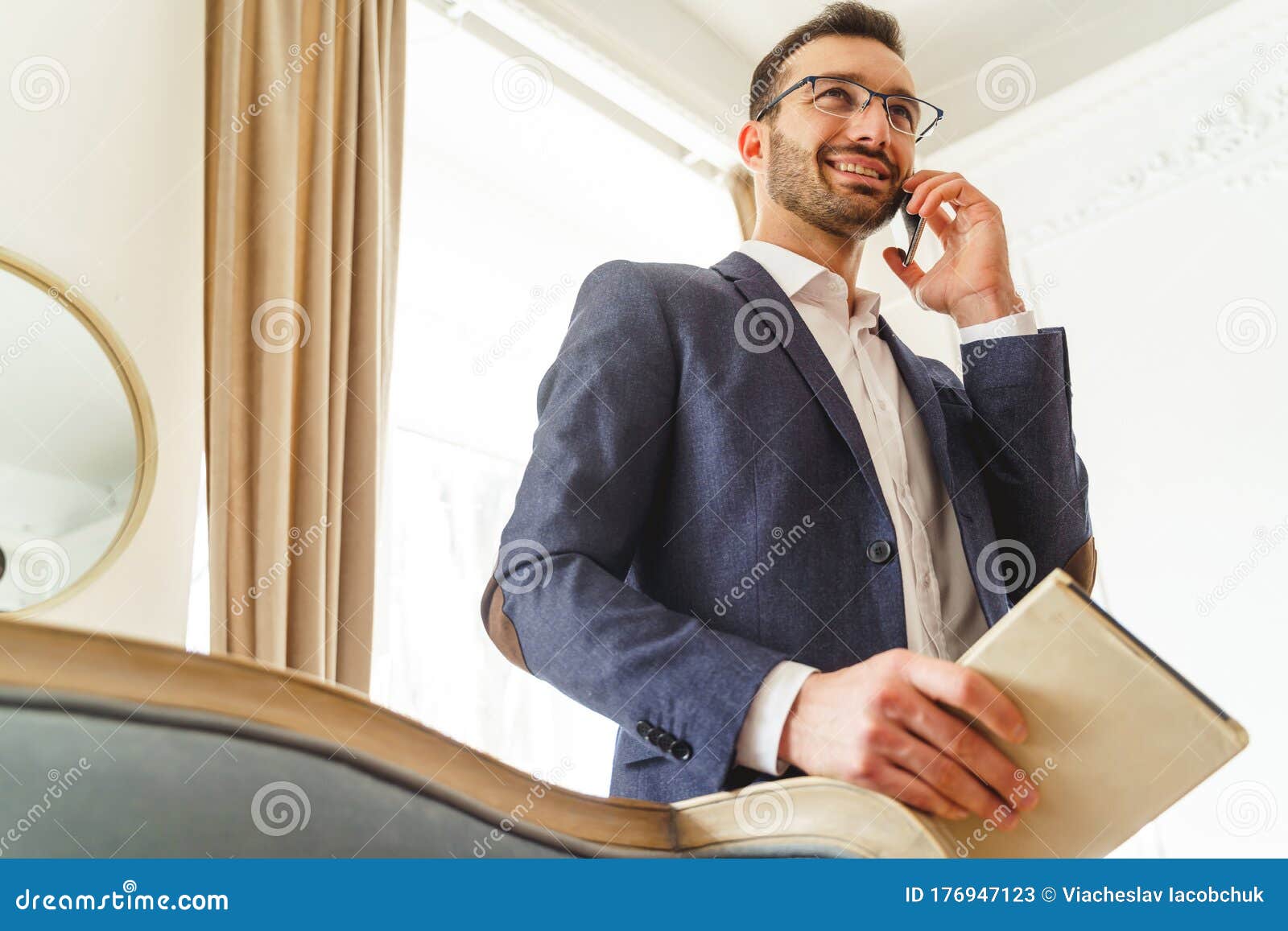 Man with a Smartphone Holding His Notepad Stock Image - Image of adult ...