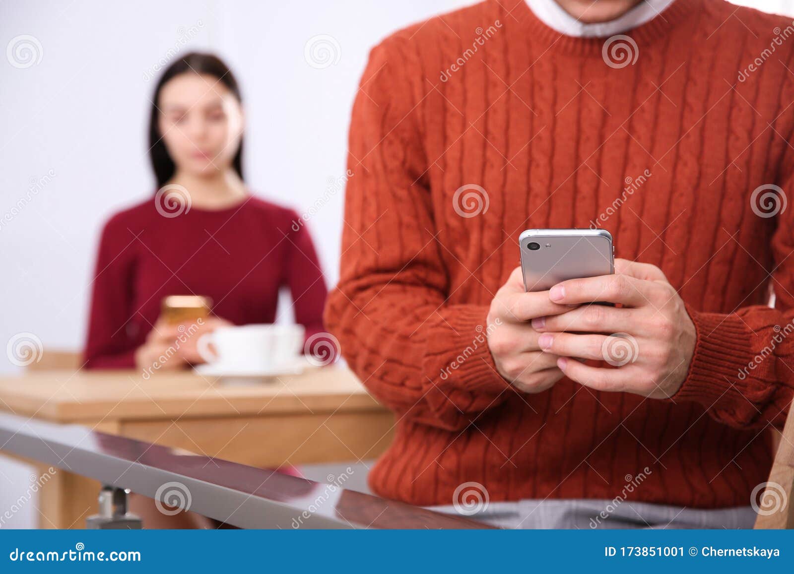 Man with Smartphone Ignoring His Girlfriend in Cafe. Relationship ...