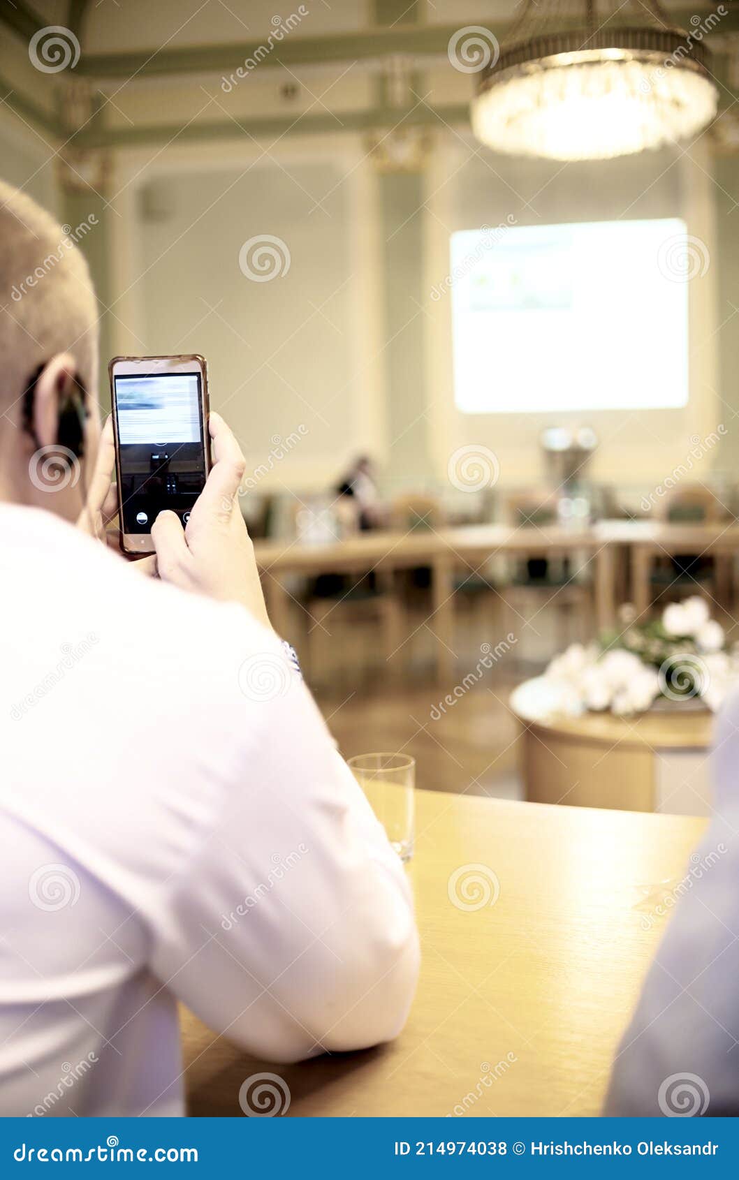 Man with a Smartphone on the Presentation Stock Photo - Image of ...