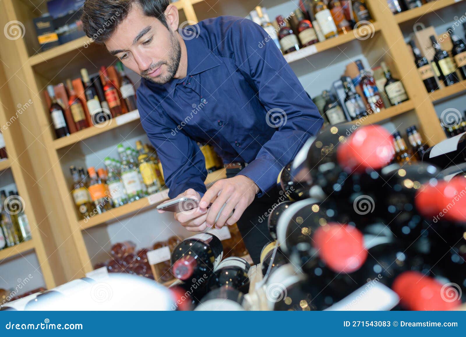 Man with Smartphone Scanning Wine Bottle Stock Image - Image of offer ...