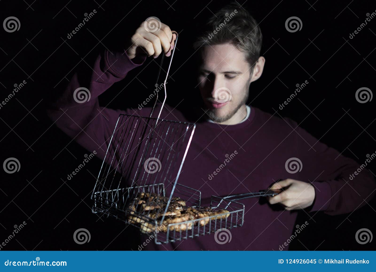 Man Smelling the Bbq Fried Chicken Meat Isolated on a Dark Mackground ...