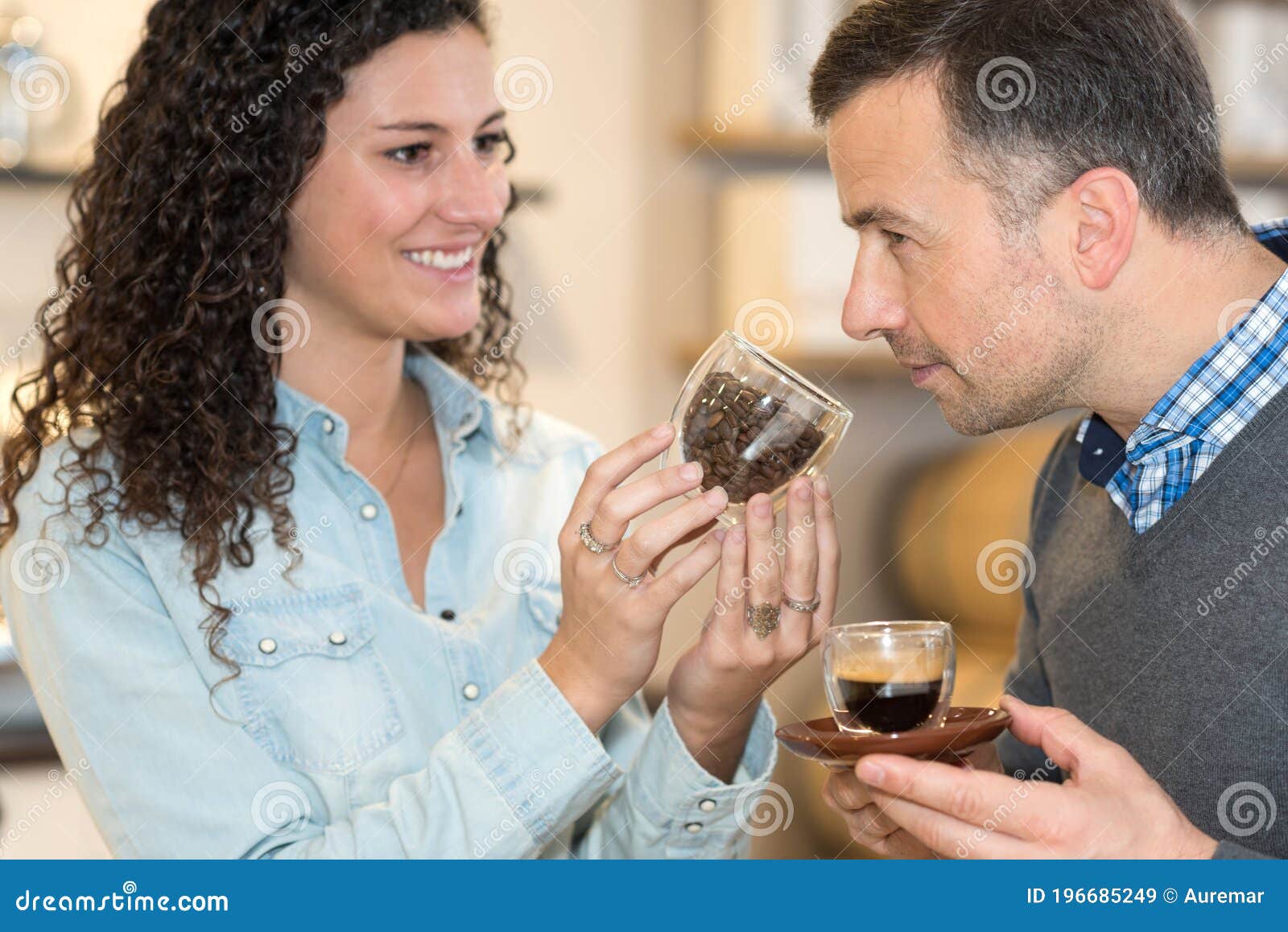 Man smelling coffee beans stock image. Image of smell - 196685249