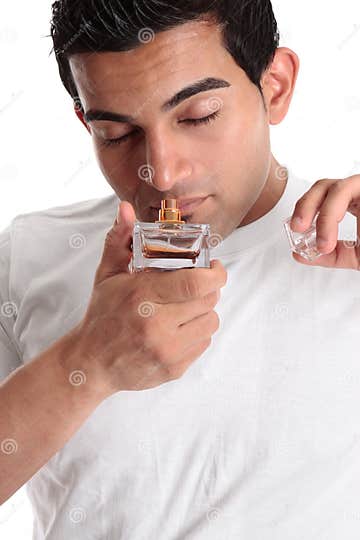 Man smelling perfume stock photo. Image of white, smelling - 13143842