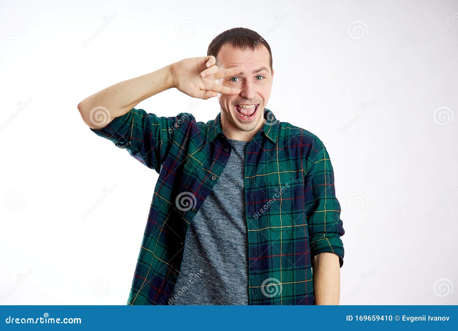 Man Smiles, a Happy Contented Face. a Guy in a Shirt Posing Stock Photo ...
