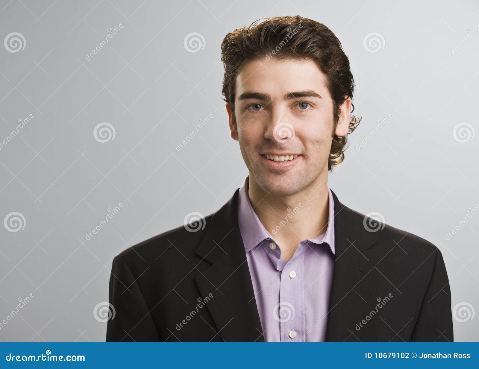 Man Smiling at Camera stock photo. Image of brown, clothing - 10679102