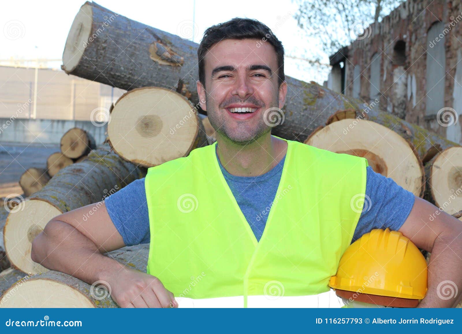 Man Smiling after Cutting a Bunch of Trees Stock Image - Image of ...