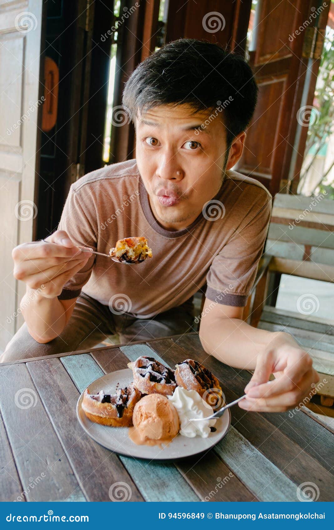Man Smiling Eating Waffle with Ice-cream at Vintage Cafe Stock Image ...