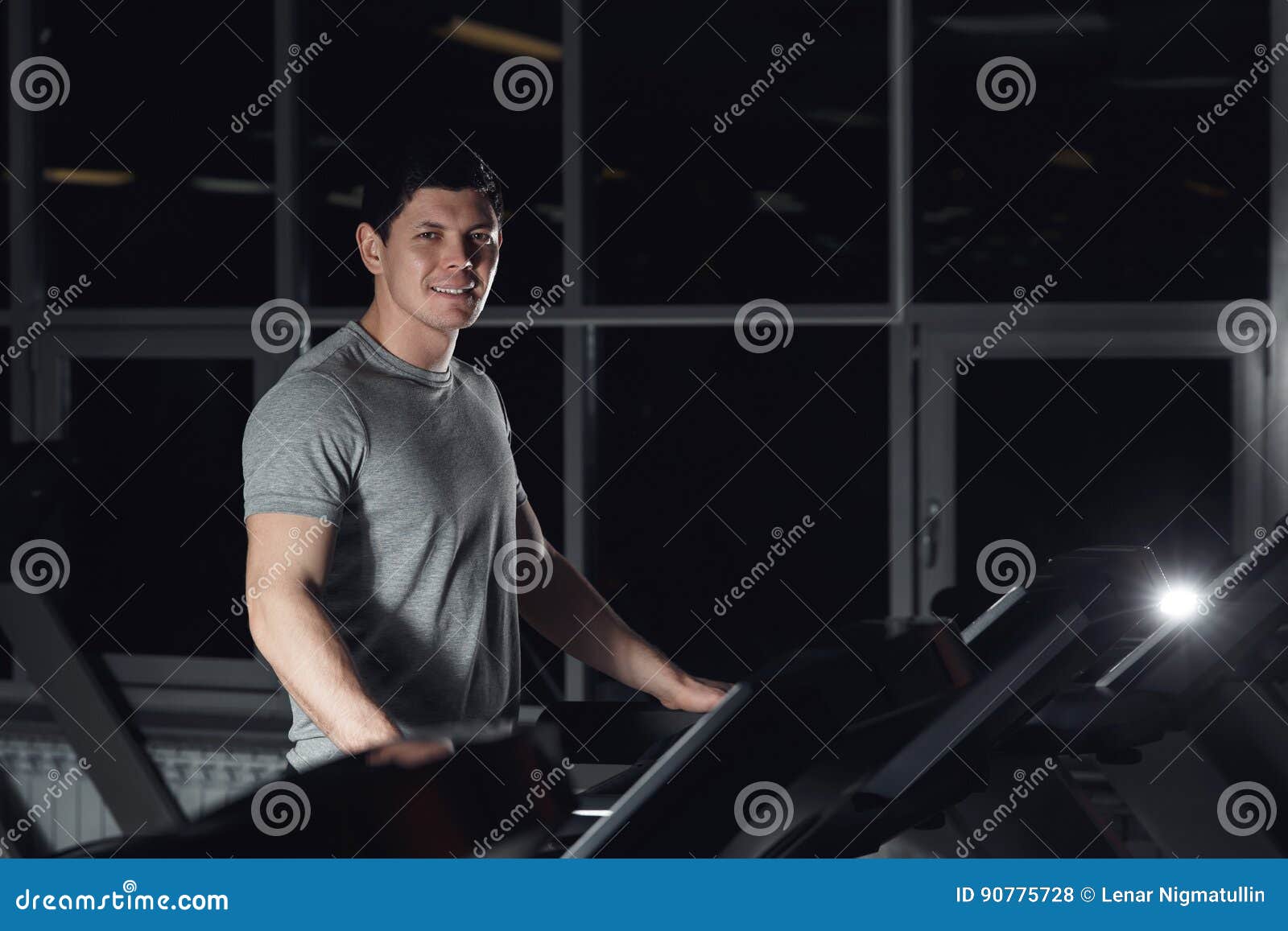 Man Smiling at the Gym Doing Exercise on the Treadmill. Stock Photo ...
