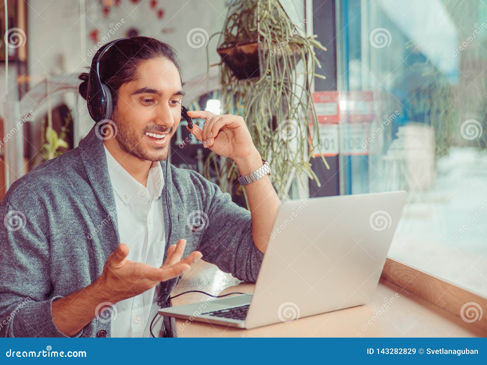 Man Smiling Having a Video Chat at Laptop Screen, Explaining Something ...