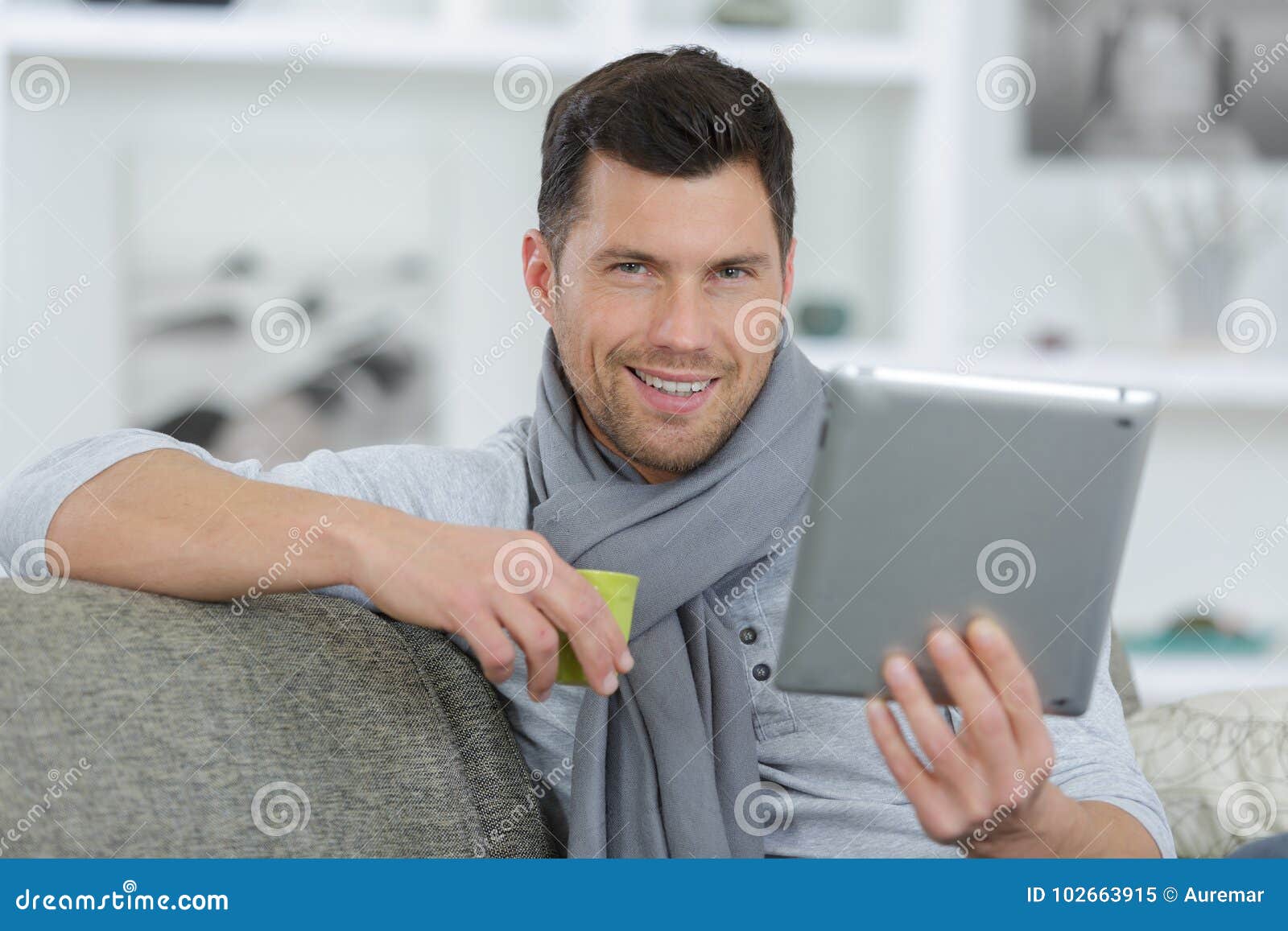 Man Smiling while Holding Tablet Stock Image - Image of serious, rest ...