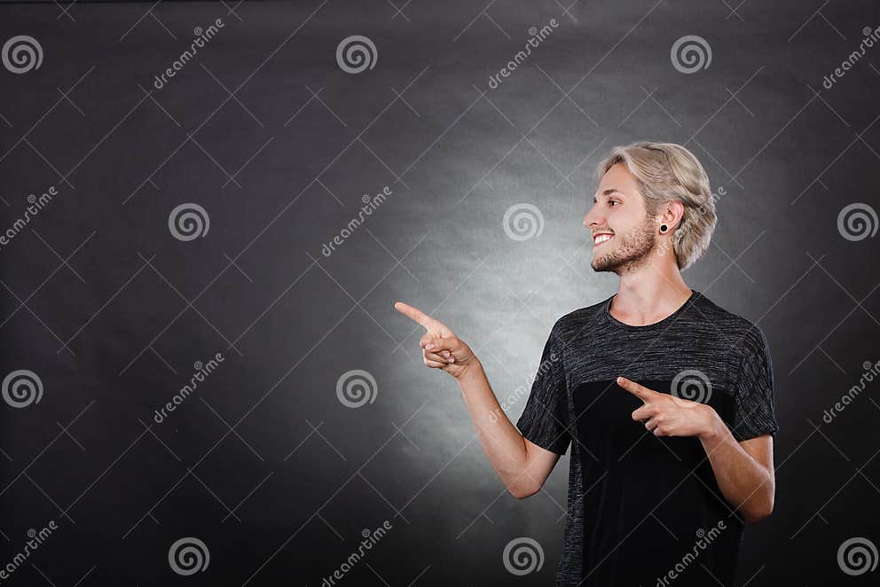 Man Smiling Point Right Direction Stock Image - Image of cheerful ...