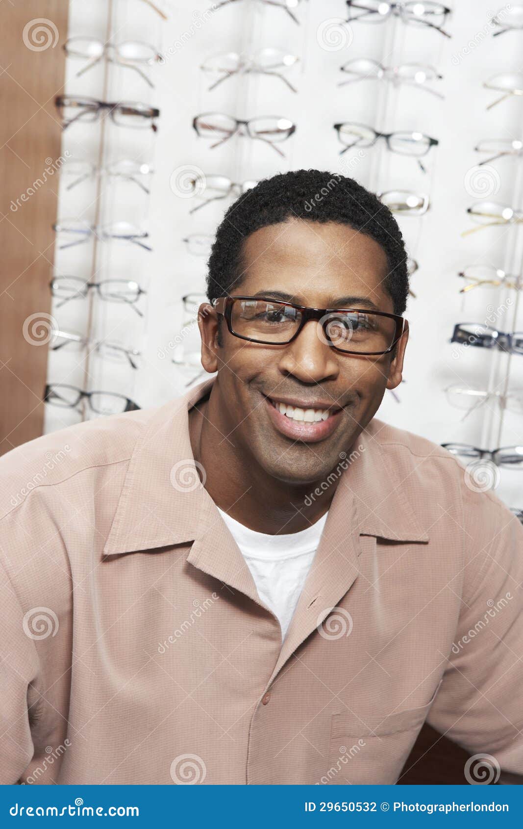 Man Smiling at Spectacles Shop Stock Photo - Image of happy, occupation ...