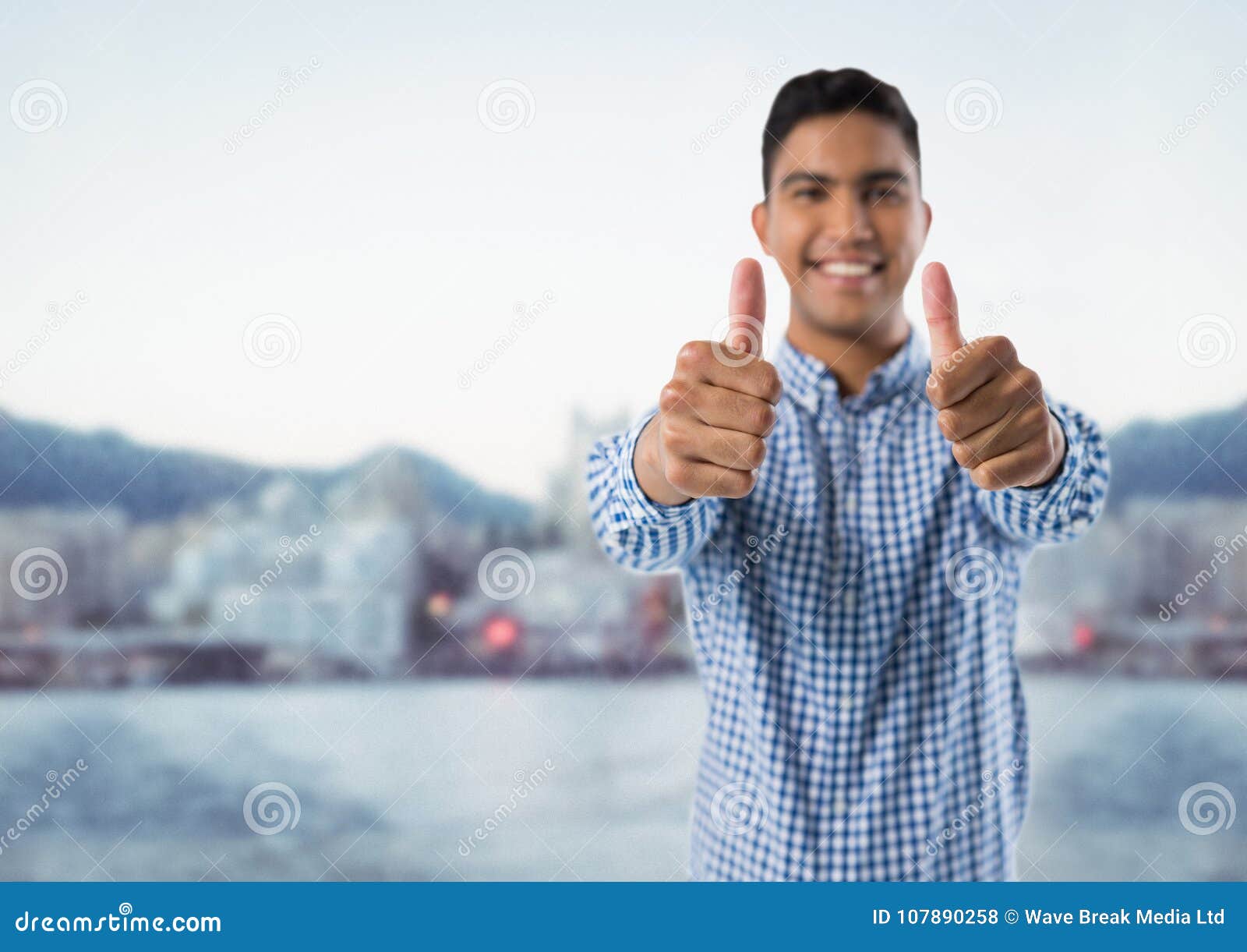 Man smiling with thumbs up stock photo. Image of happy - 107890258