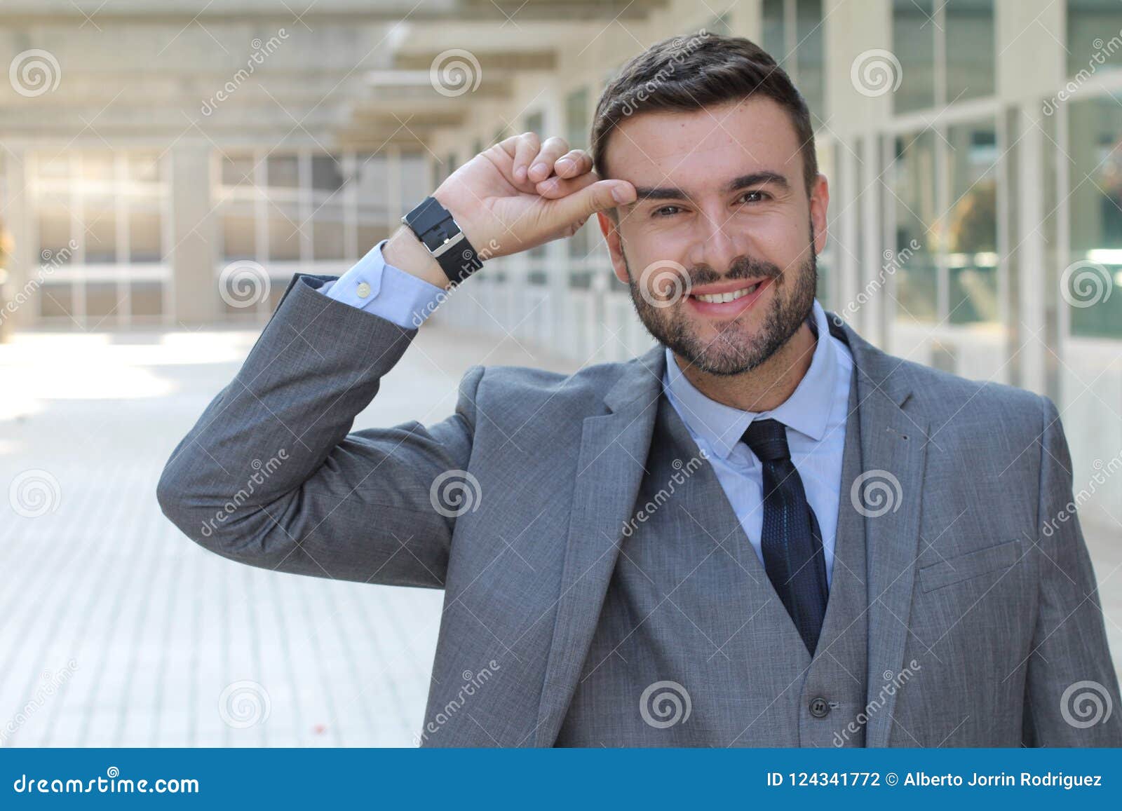 Man Smiling while Touch His Eyebrow Stock Photo - Image of model, adult ...