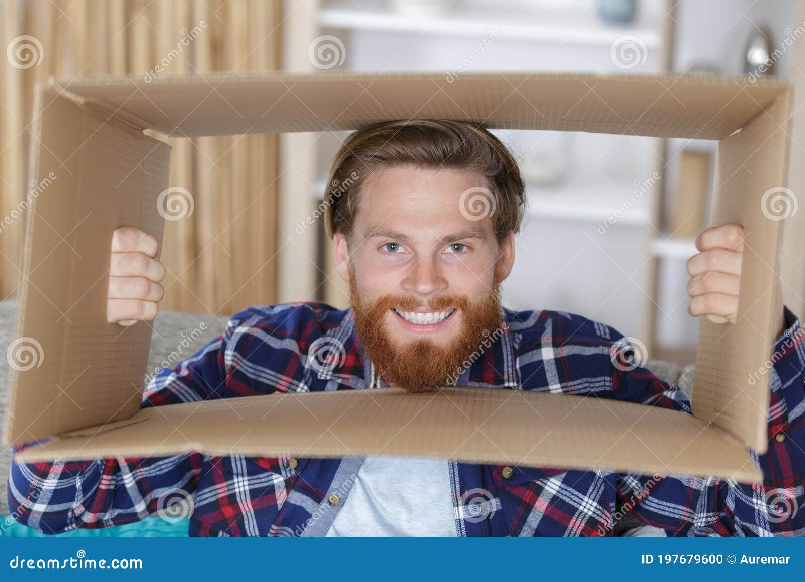 Man Smiling Unpacking and Opening Carton Box and Looking Inside Stock ...