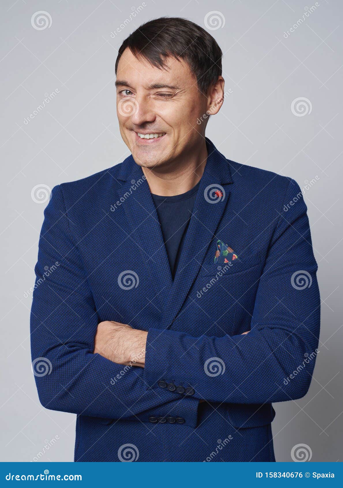 Man Smiling and Winking To the Camera Stock Photo - Image of attractive ...