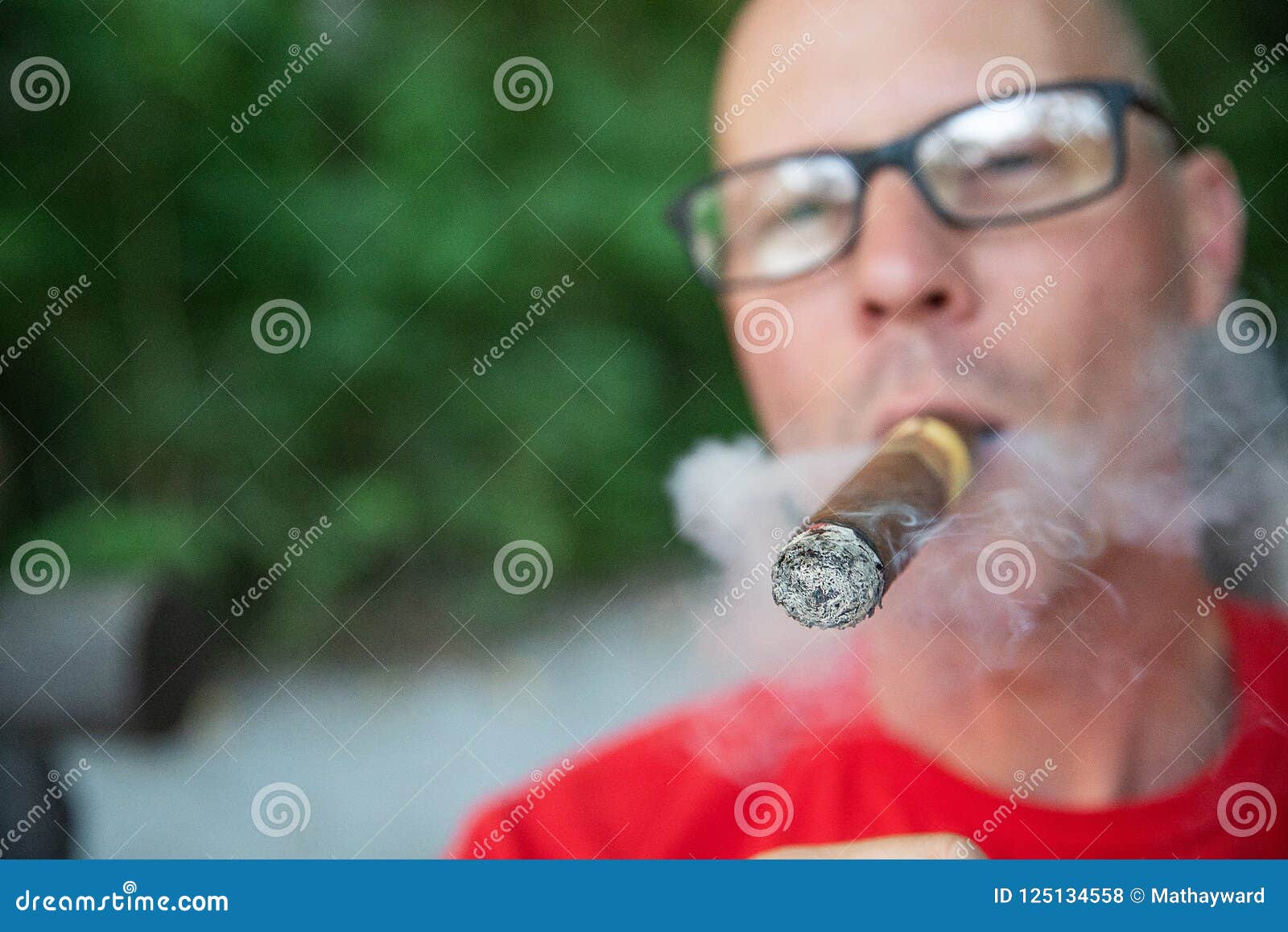 Man smoking cigar stock photo. Image of smoke, wearing - 125134558