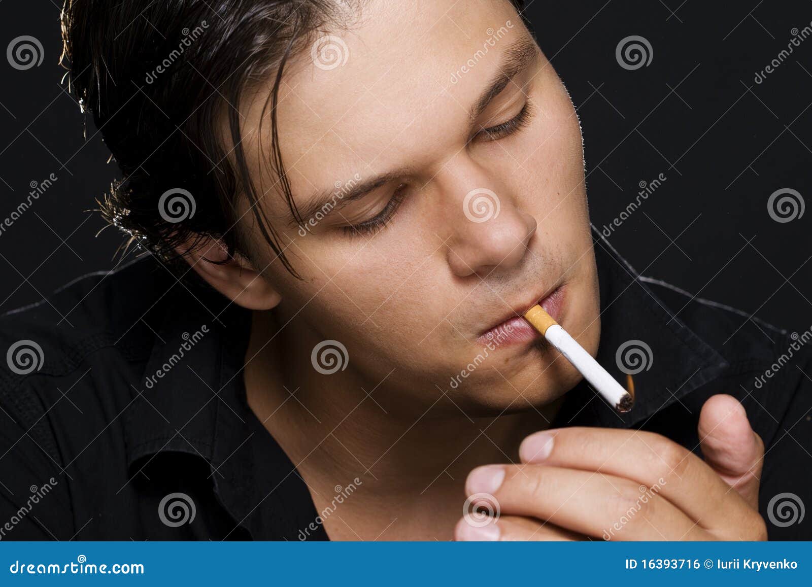 Man smoking a cigarette stock photo. Image of concept - 16393716