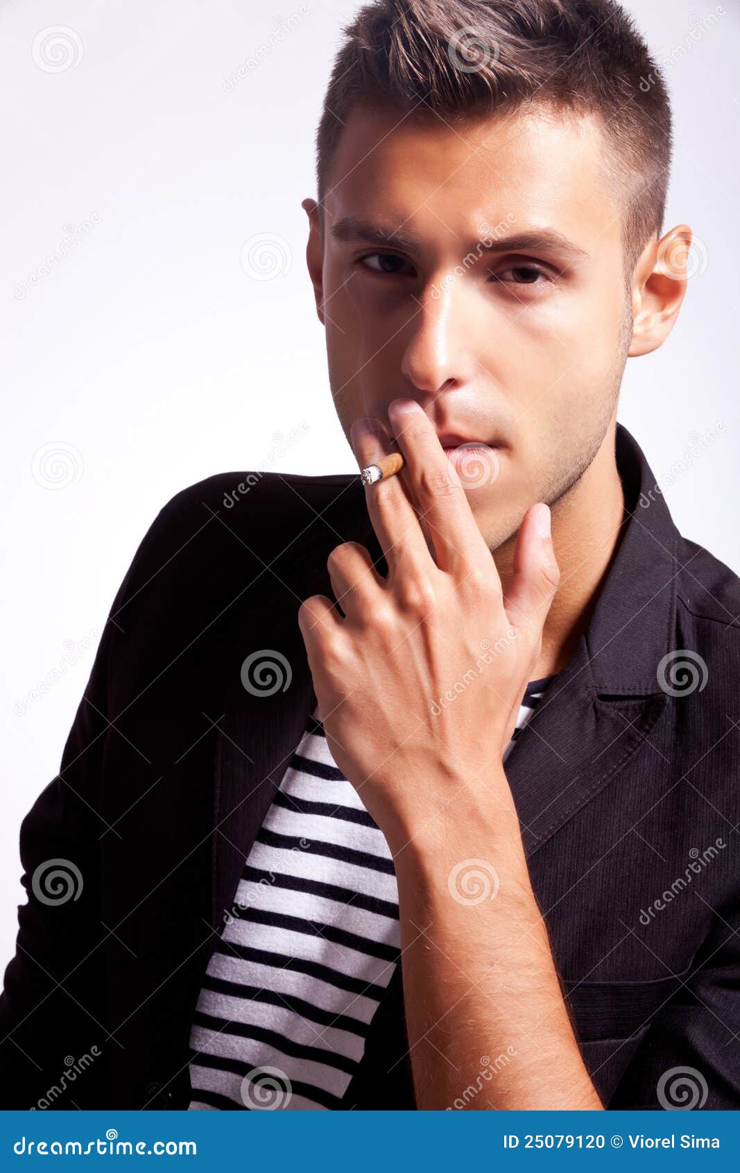 Man Smoking Cigarette Stock Photo - Image: 25079120