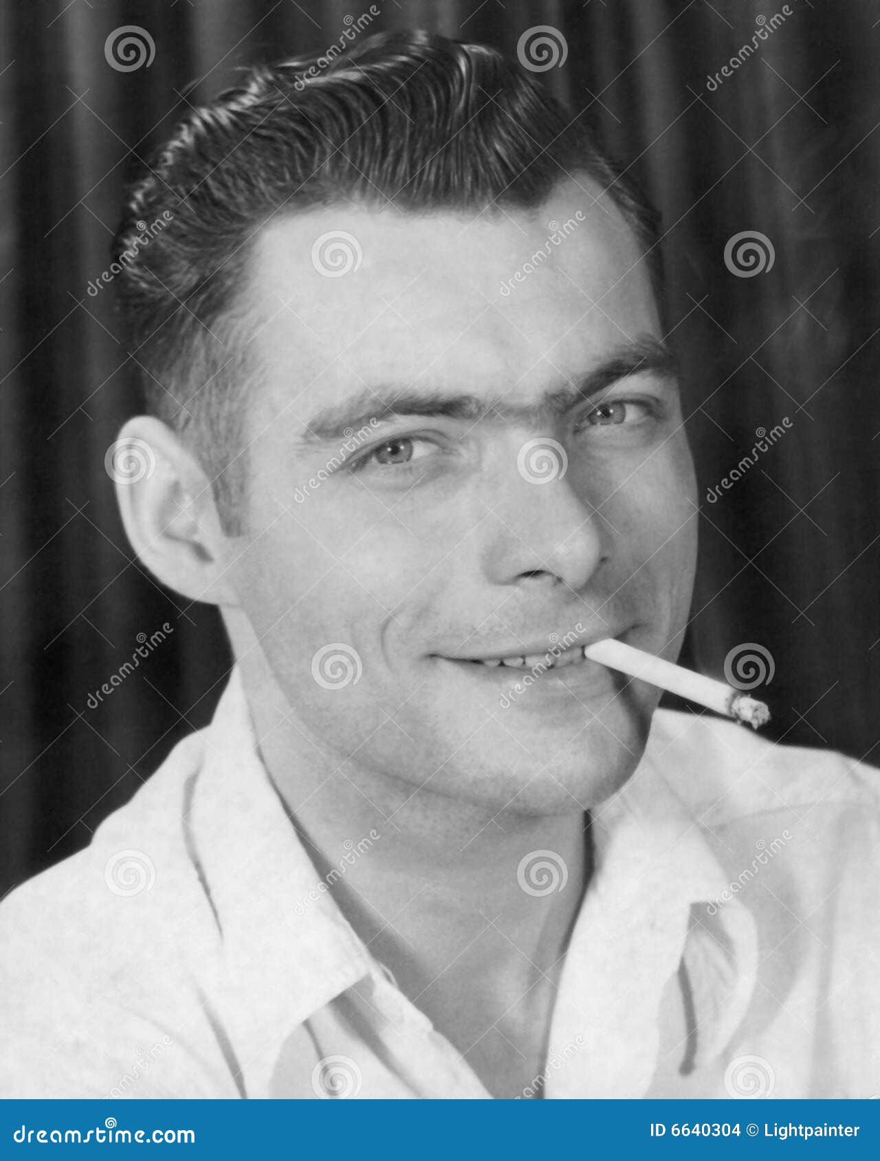 Man smoking cigarette stock photo. Image of grins, smiles - 6640304