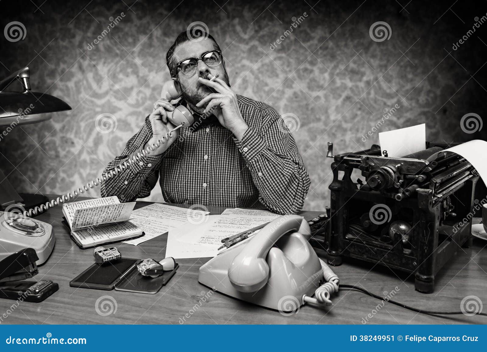 Man Smoking a Cigarette while Talking on the Phone Stock Image - Image ...