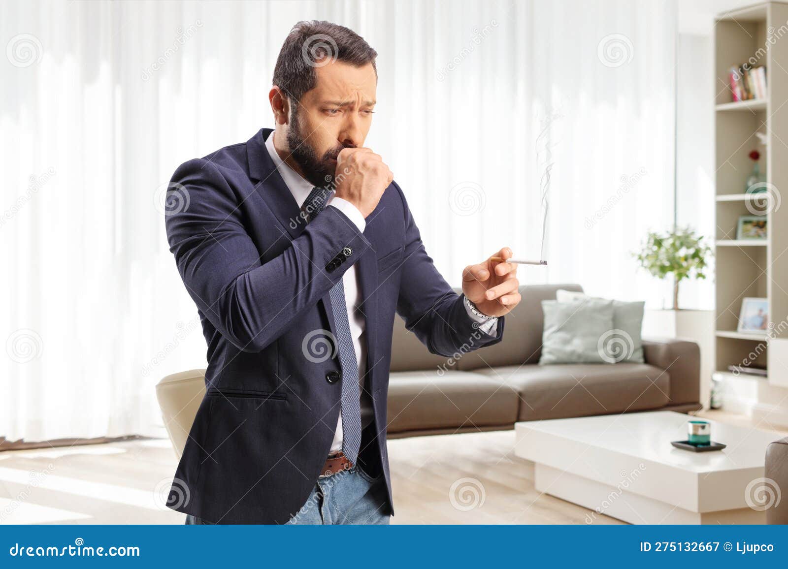 Man Smoking and Coughing at Home in a Living Room Stock Image - Image ...