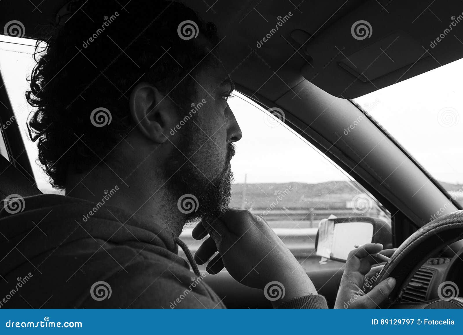 Man smoking driving stock image. Image of adult, back - 89129797