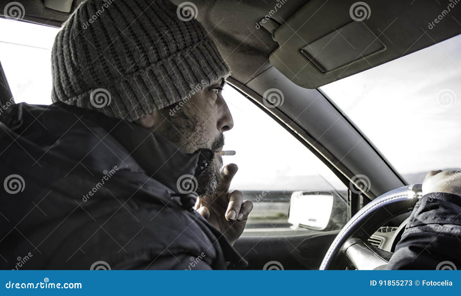 Man smoking driving stock image. Image of elegant, attractive - 91855273