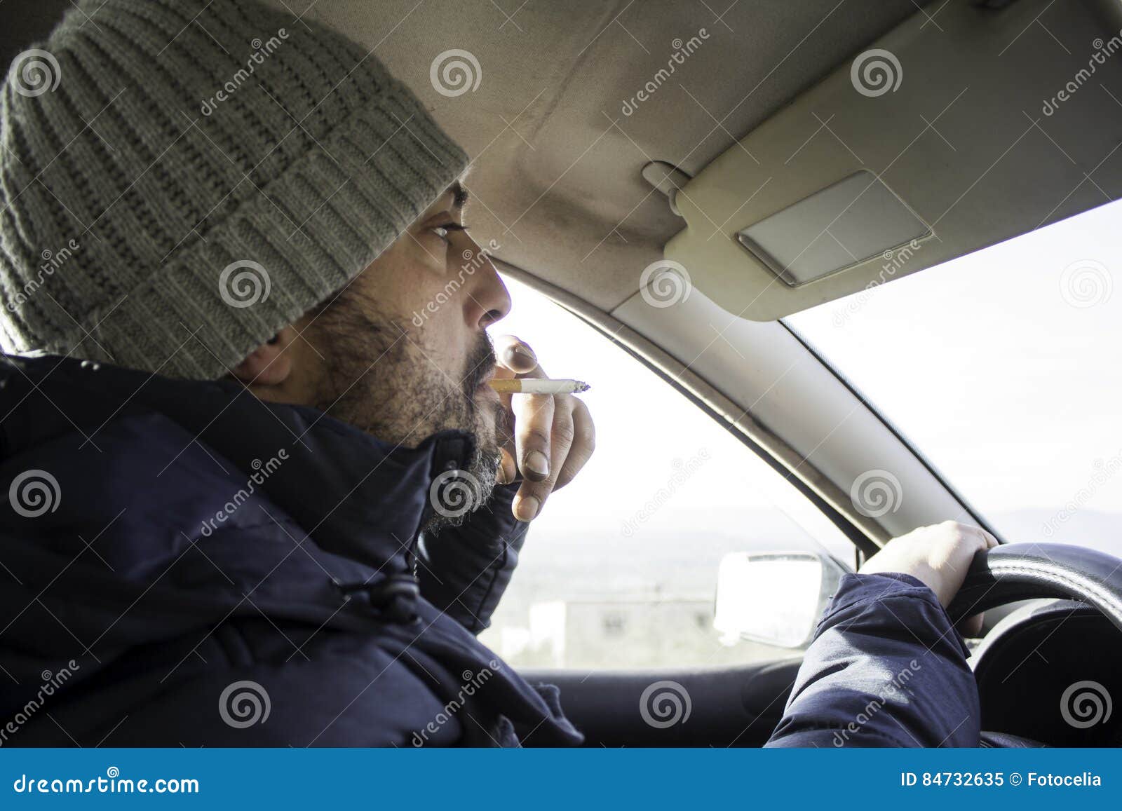 Man smoking driving stock image. Image of driving, people - 84732635