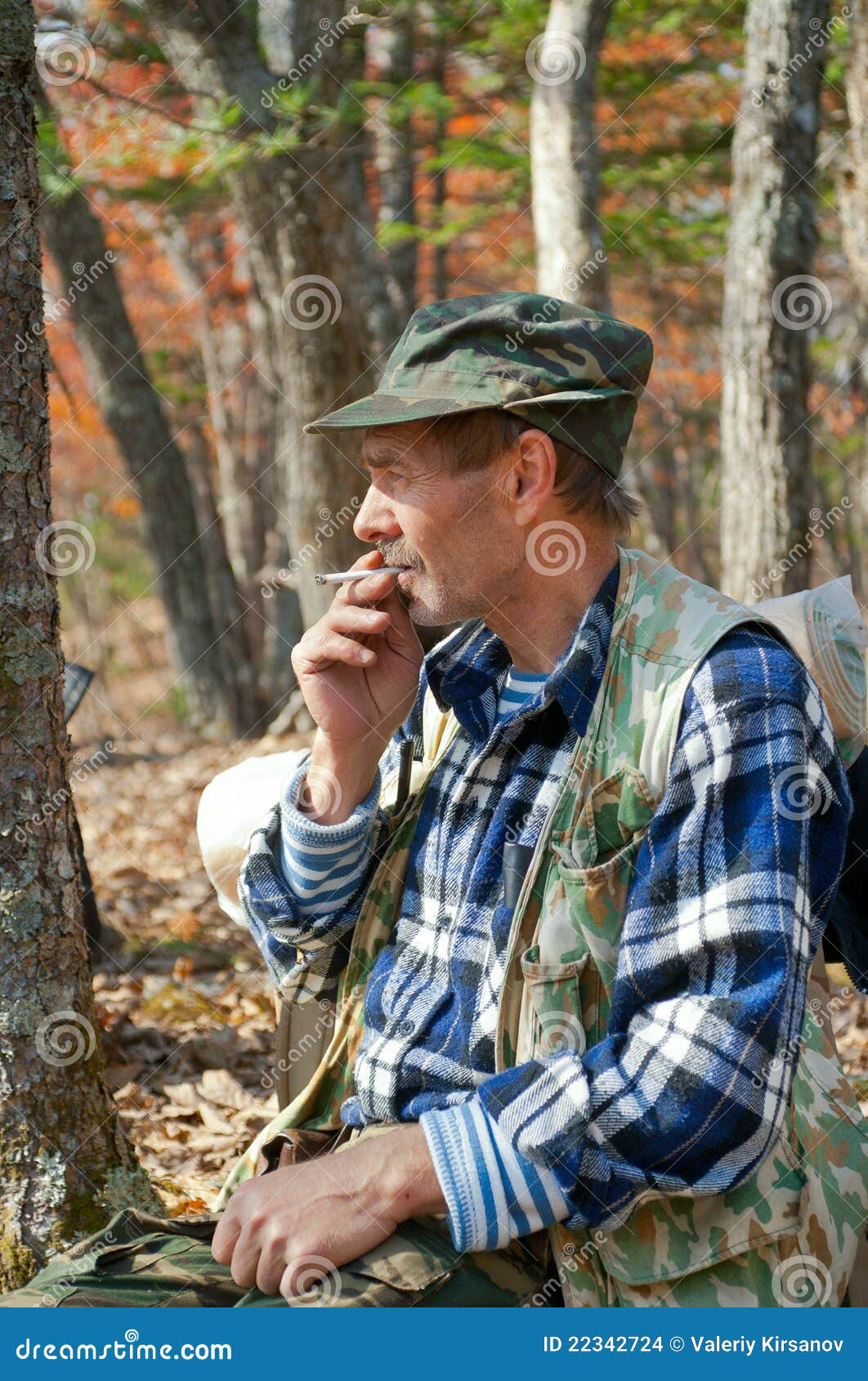 Man smoking in forest stock photo. Image of smoke, relax - 22342724