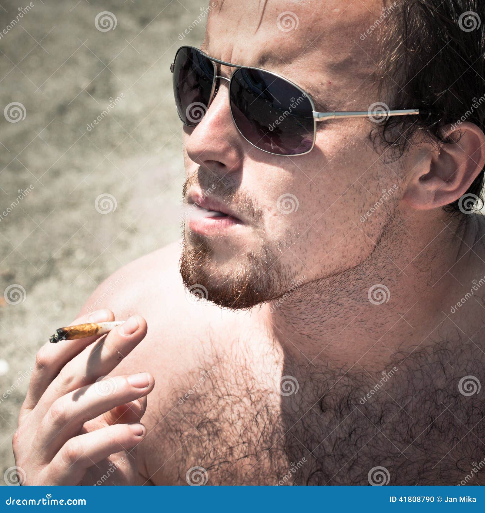 Man smoking hashish joint stock photo. Image of dealer - 41808790