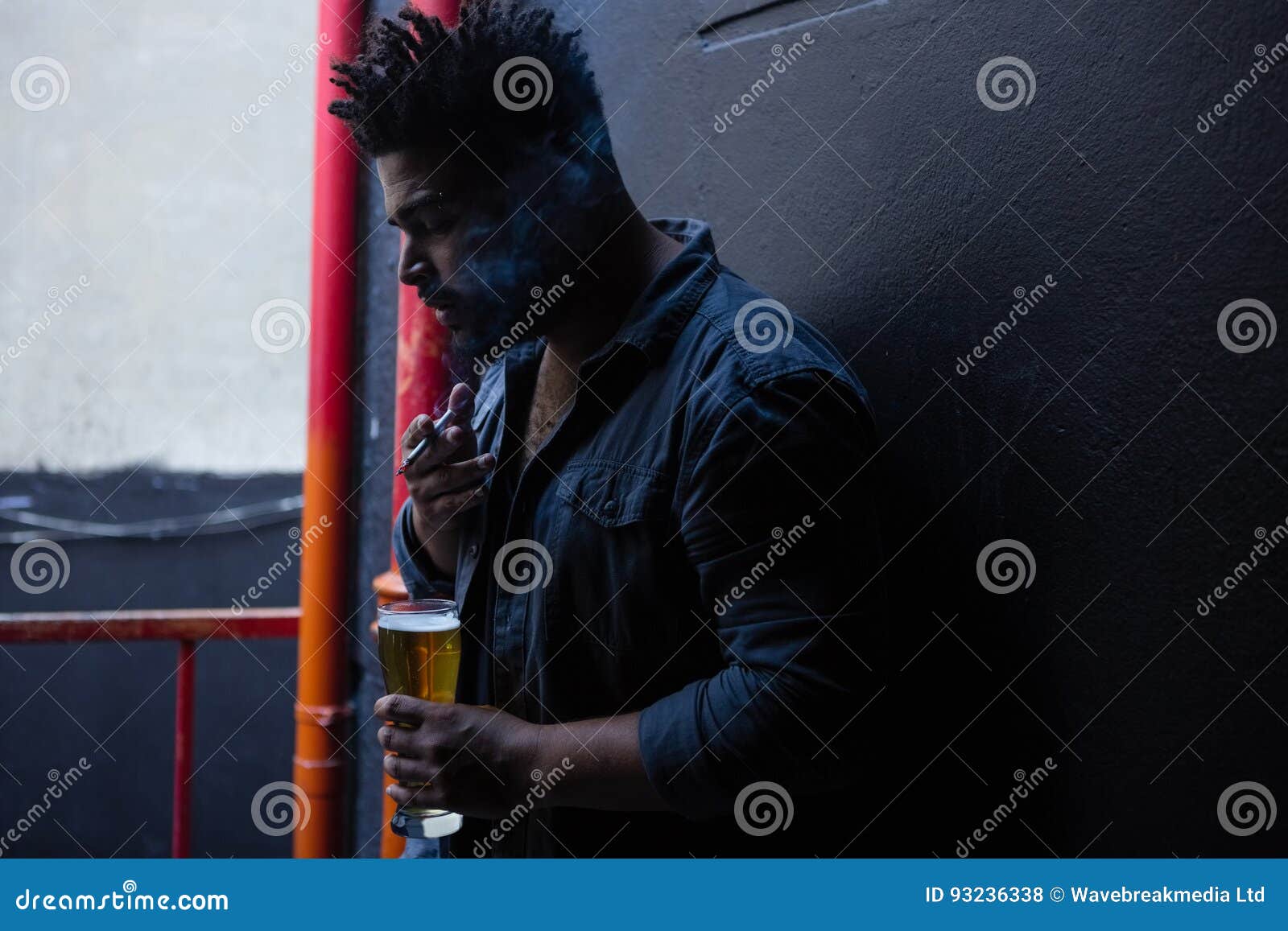Man Smoking while Having Beer Stock Photo - Image of alcoholic, modern ...