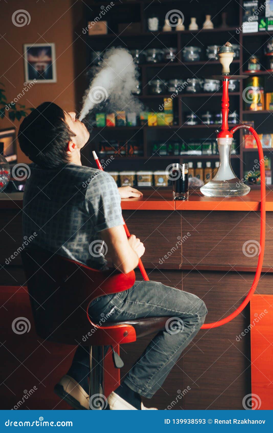 Man smoking a hookah stock image. Image of beauty, face - 139938593