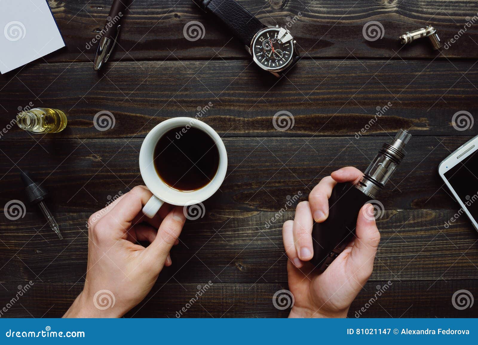 Man Smoking Vape or Electronic Cigarette and Drinking Coffee. View from ... Man Smoking Vape or Electronic Cigarette and Drinking Coffee. View from ...